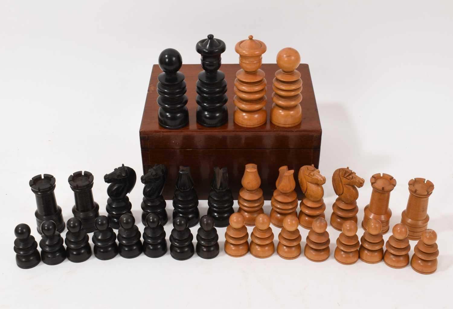 Lot 705 - 19th century turned wooden chess set in a