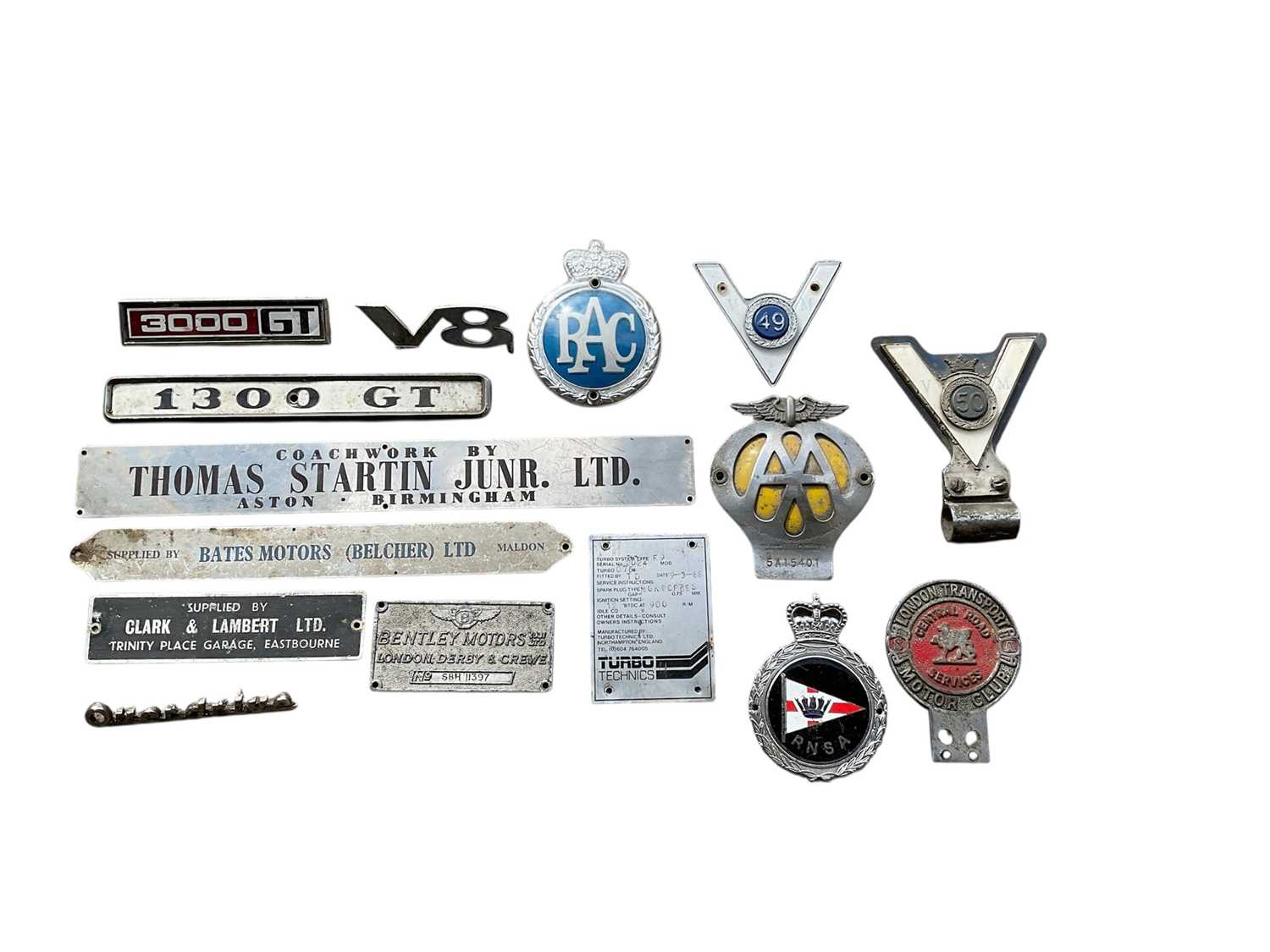 Lot 128 - Group of classic car badges and plaques to