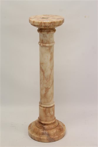 Lot 1339 - Carved pink variagated marble column with