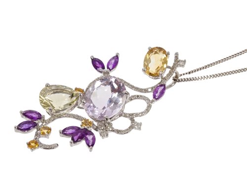 Lot 487 - Diamond and gem set pendant of stylised