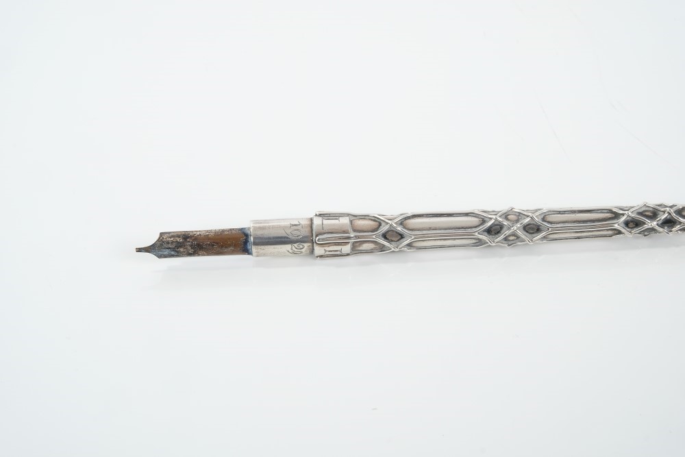 Lot 365 - 1920s Omar Ramsden silver dip pen of slender.