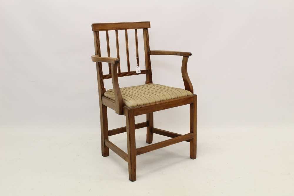 Lot 1409 - George III yew open elbow chair