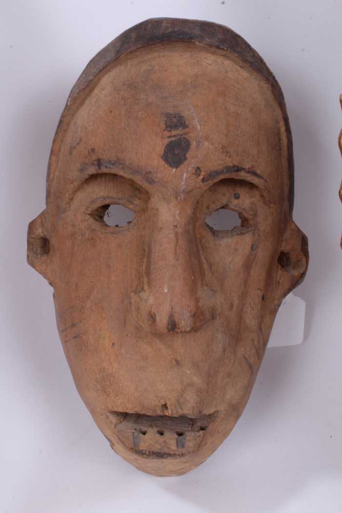 Lot 874 - Three tribal masks, Sudan and others