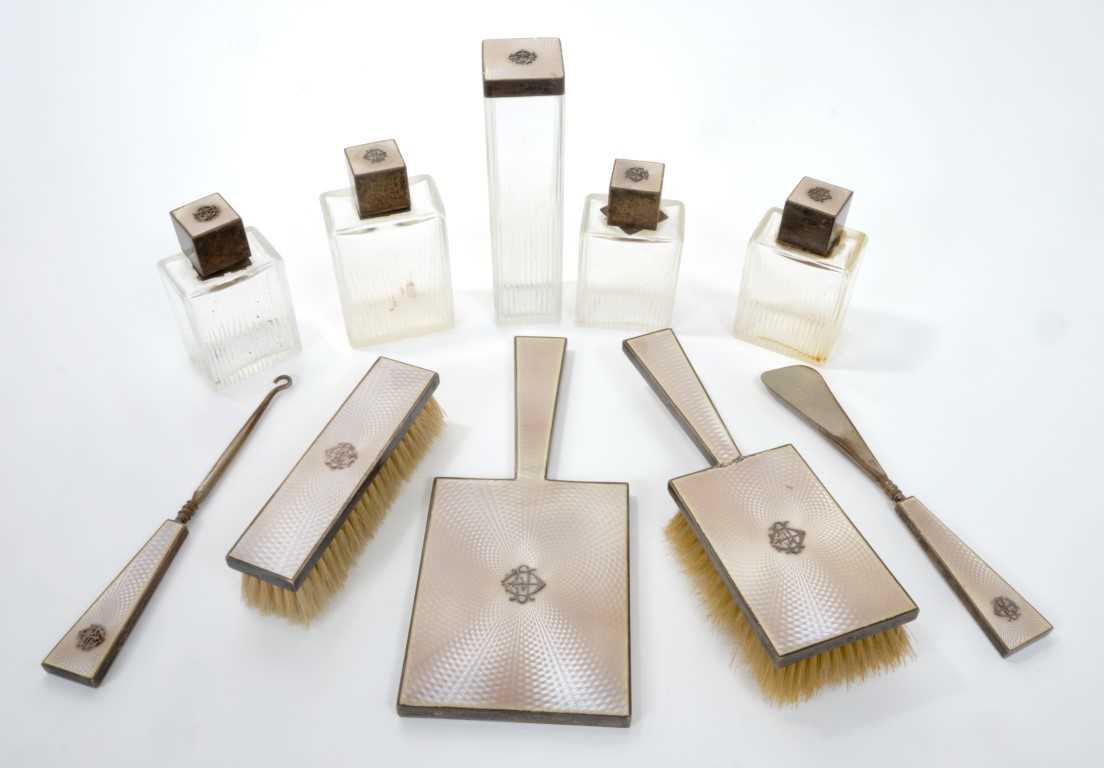 Lot 457 - Asprey silver and enamel ten piece dressing