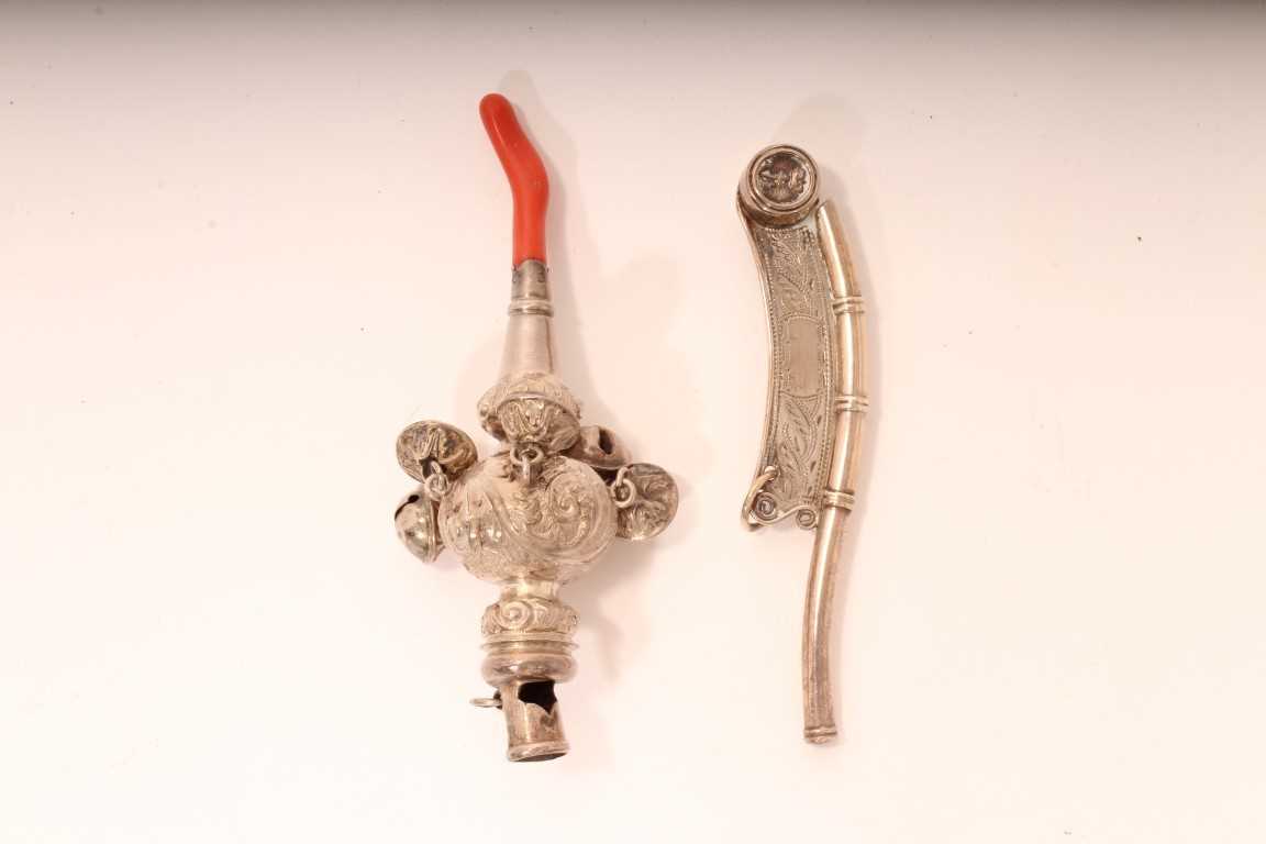 Lot 403 - Victorian silver rattle with embossed