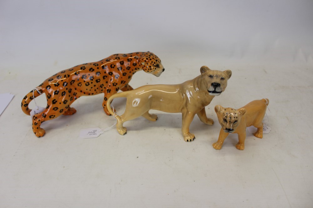 Lot 2046 - Three Beswick models - Leopard, Lioness and
