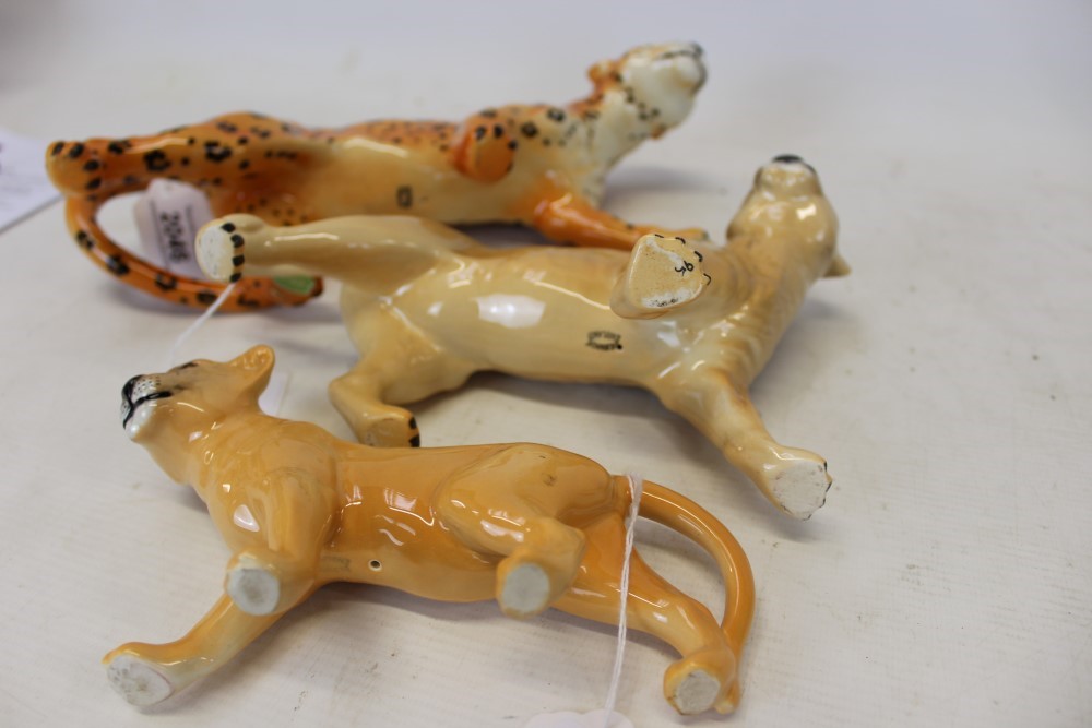 Lot 2046 - Three Beswick models - Leopard, Lioness and