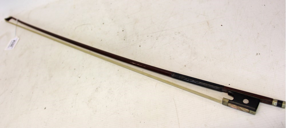 Lot 121 - Antique violin bow, stamped Nach Vuillaume,