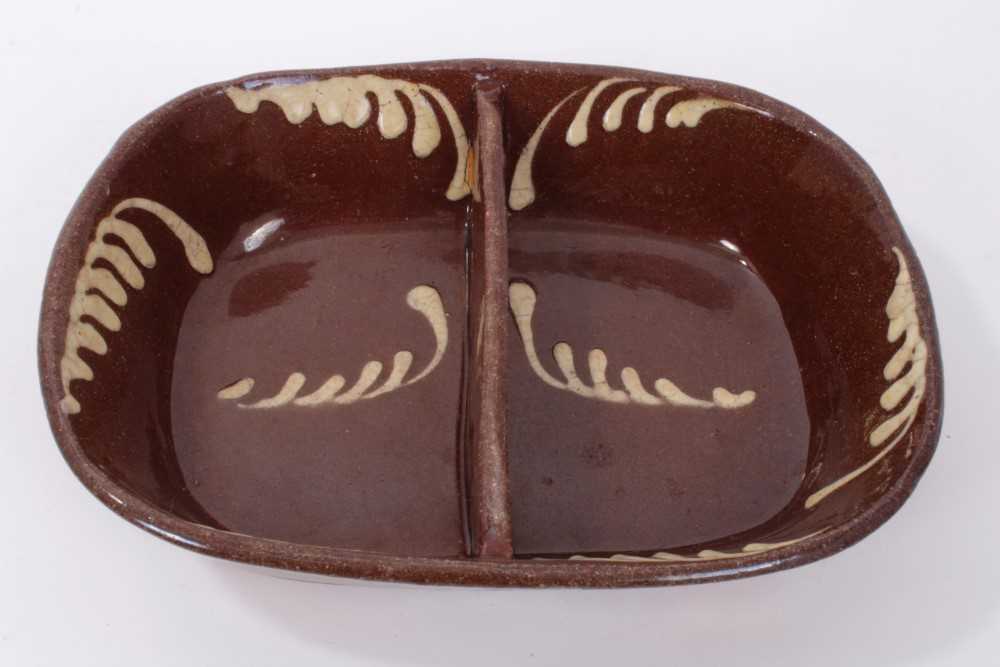 Lot 146 - 19th century slip ware dish with central