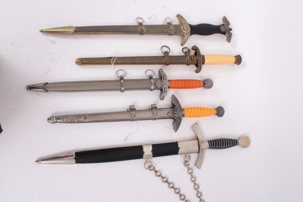 Lot 837 - Collection of five reproduction Nazi daggers