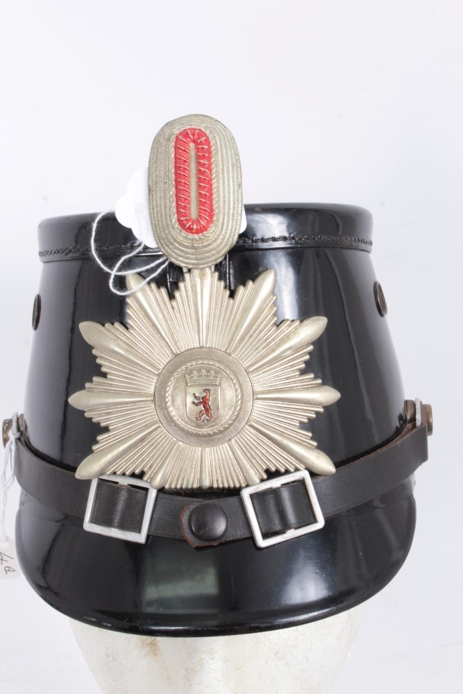 Lot 575 - Post War German Berlin Police Shako, with