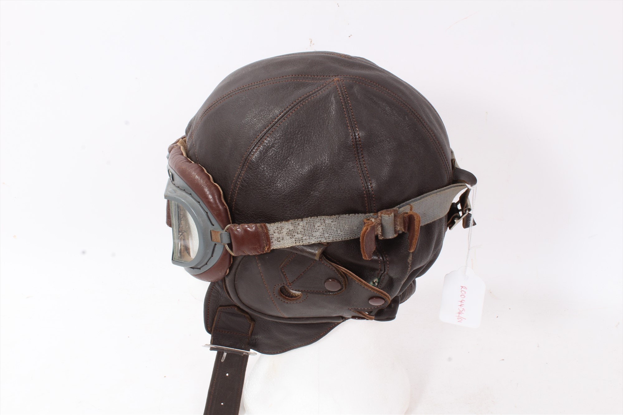 Lot 558 - Vintage pilot’s brown leather flying helmet