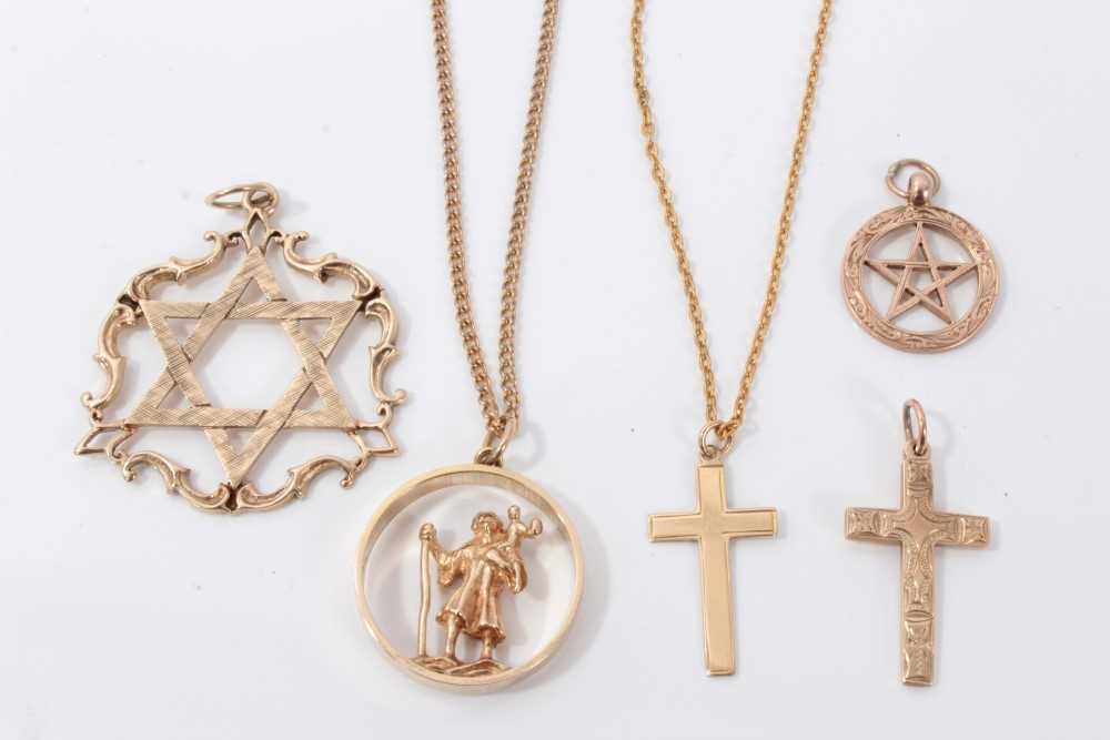 Lot 3391 - Two 9ct gold Star of David pendants, 9ct