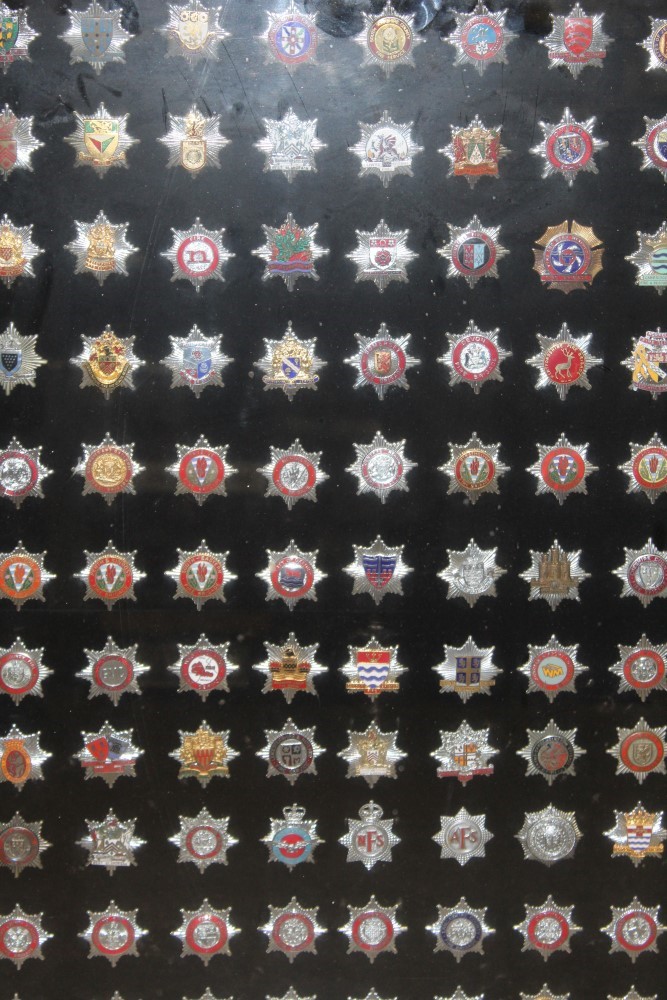 Lot 3725 - A collection of Fire Brigade cap badges in