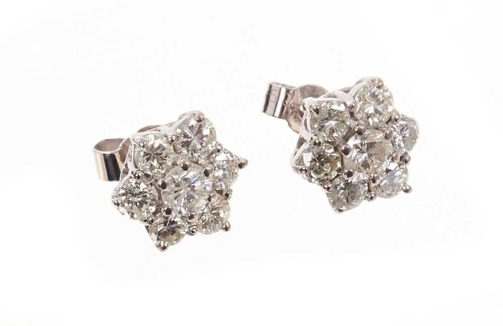 Lot 437 - Pair of brilliant cut diamond star shaped
