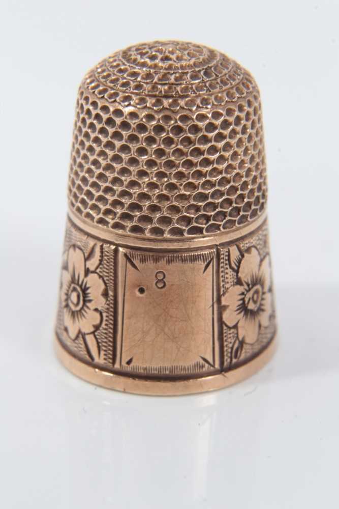 Lot 873 - 19th century rose gold thimble, size number