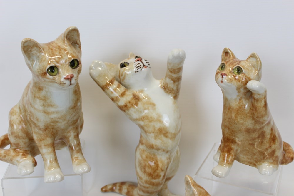 Lot 2025 - Four various Winstanley cat ornaments of