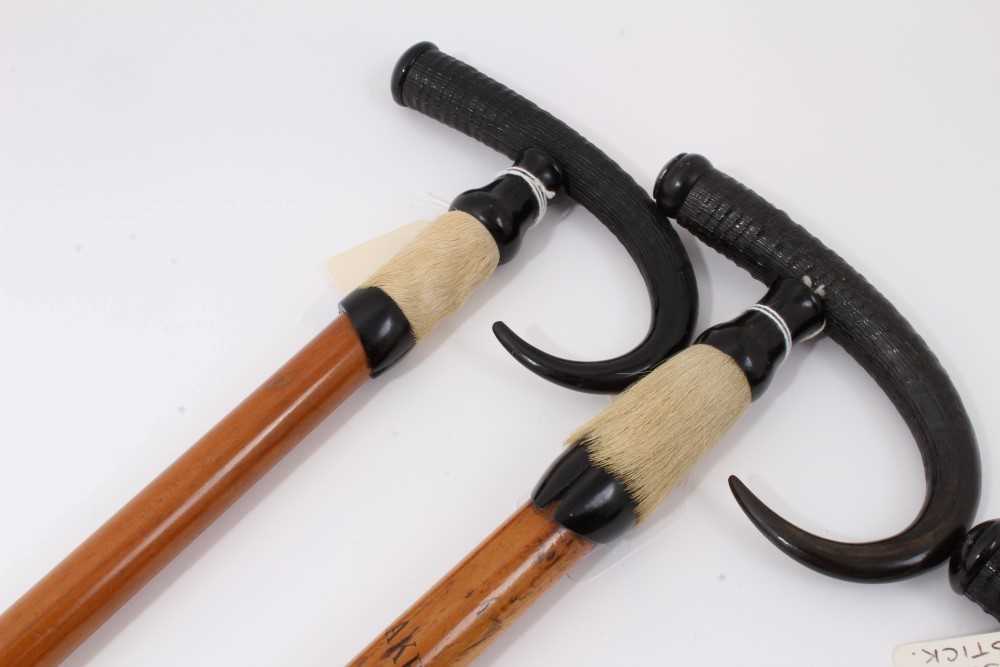 Lot 3667 - Four Alpine walking sticks with Ibex horn