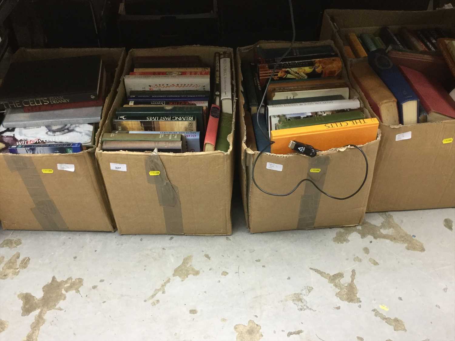 Lot 327 - Five boxes of assorted books to include