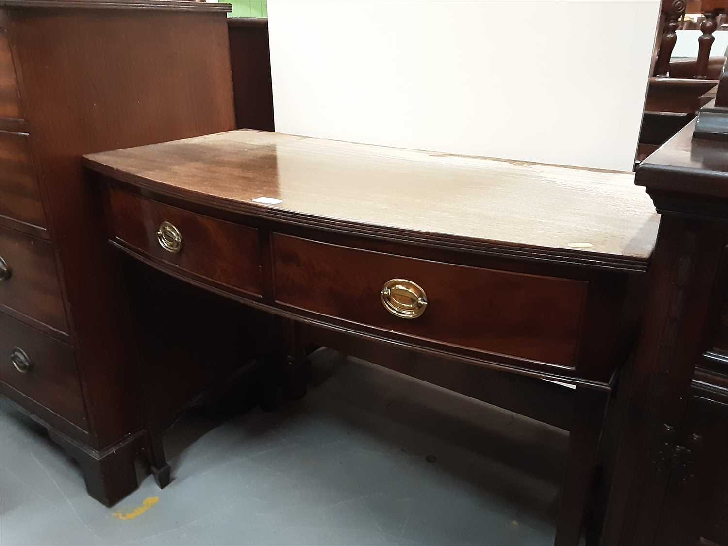 Lot 880 - Georgian style mahogany bow front table with