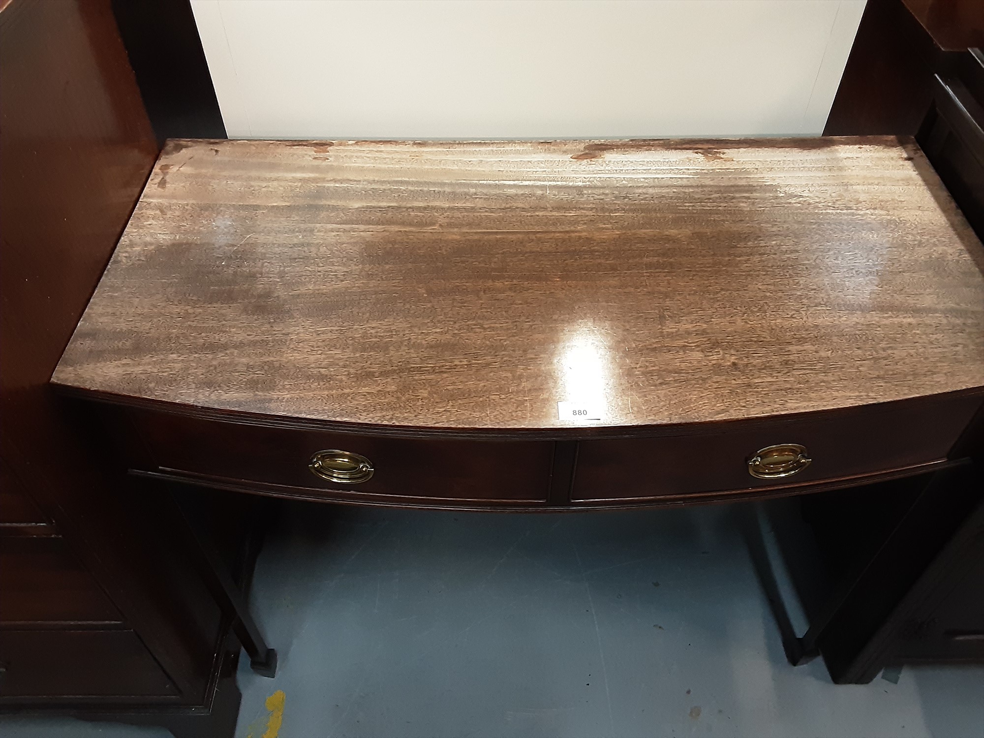 Lot 880 - Georgian style mahogany bow front table with