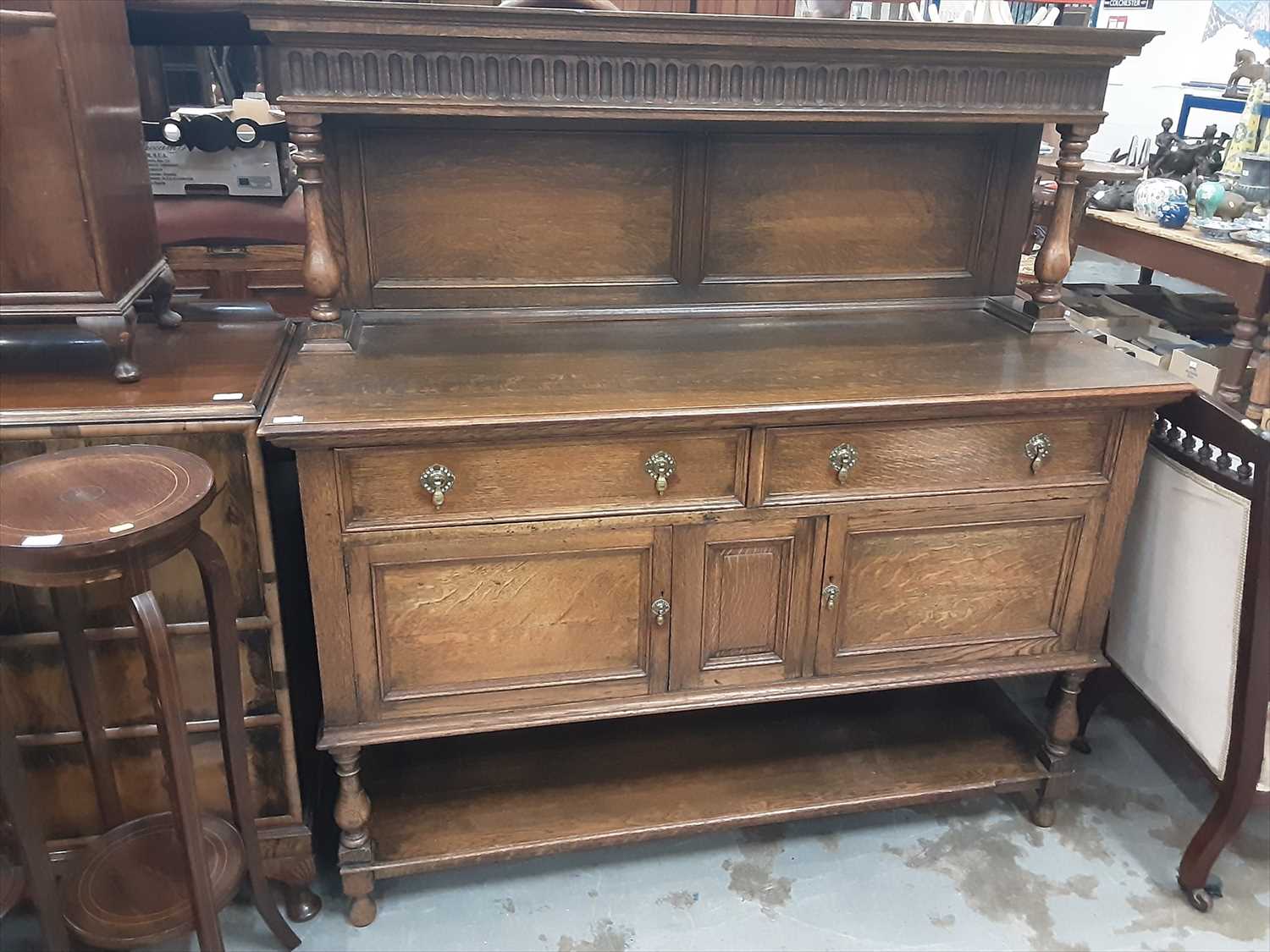 Lot 941 - 1920s oak sideboard with raised back