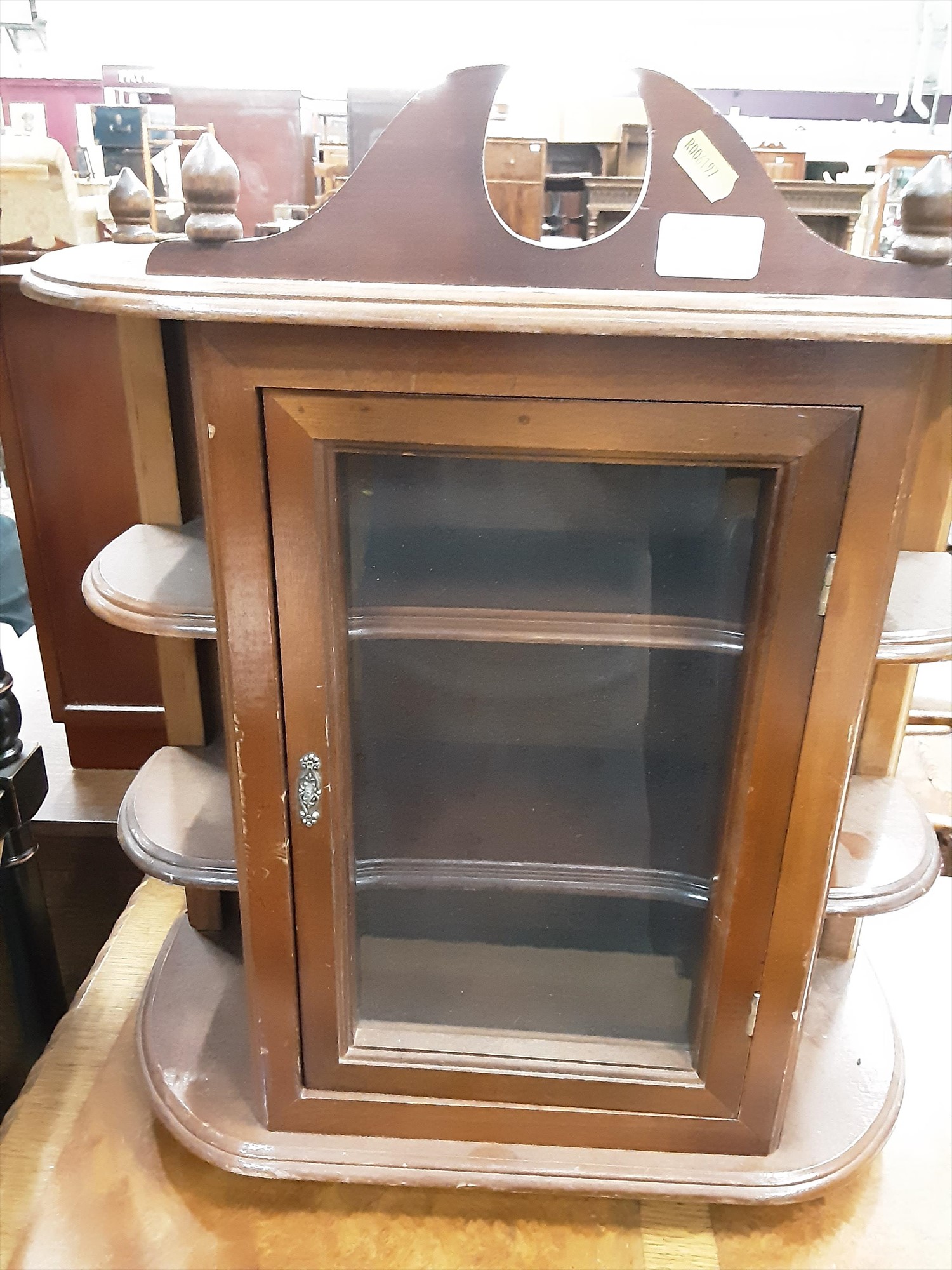 Lot 1081 - Two small display cabinets and an oval wall