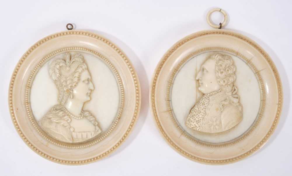 Lot 775 - Pair of good quality circular carved ivory