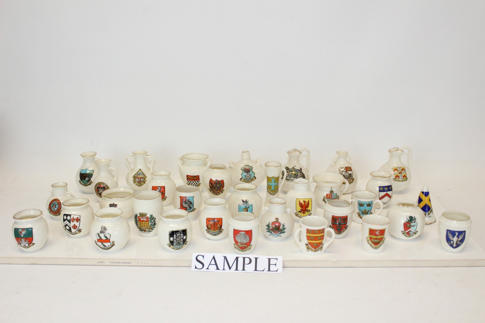 Lot 2057 - Selection of W. H. Goss crested china (45