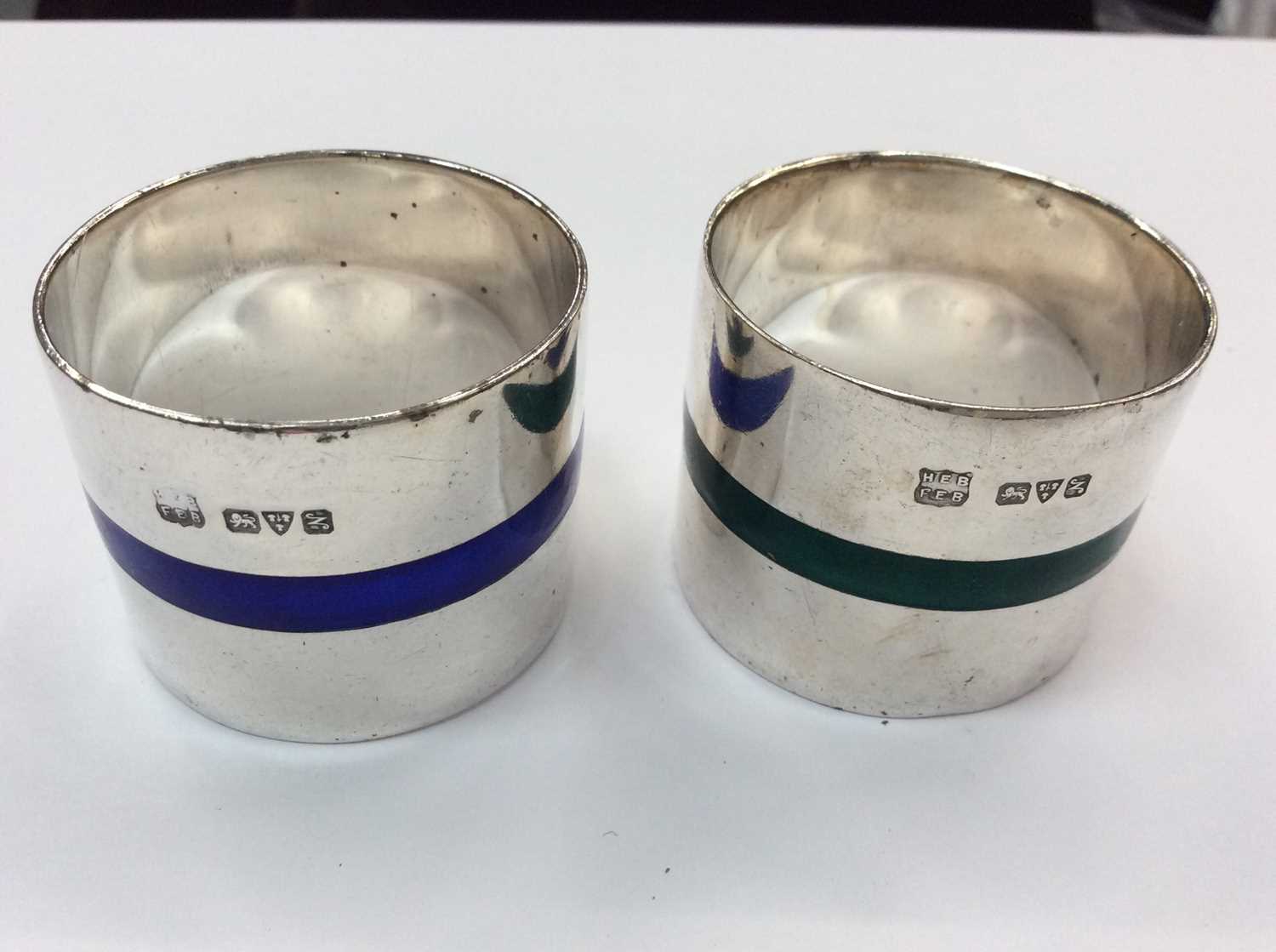 Lot 658 - Two silver topped cut glass vanity jars and
