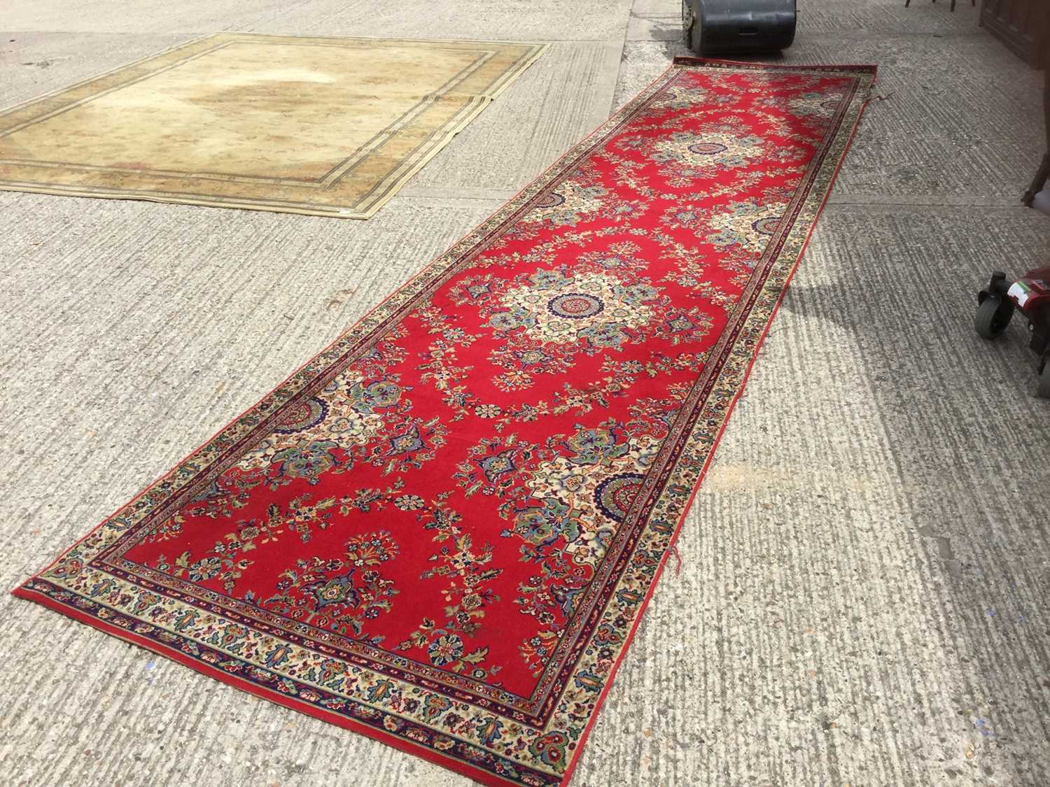 Lot 1028 - Administer Wilton Rug on red ground,
