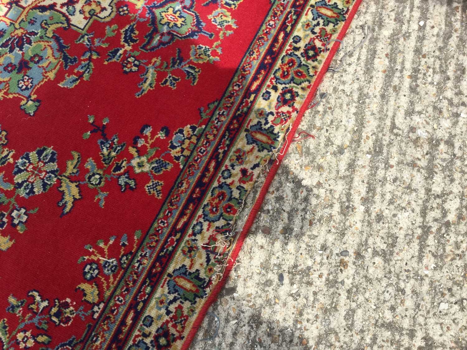 Lot 1028 - Administer Wilton Rug on red ground,