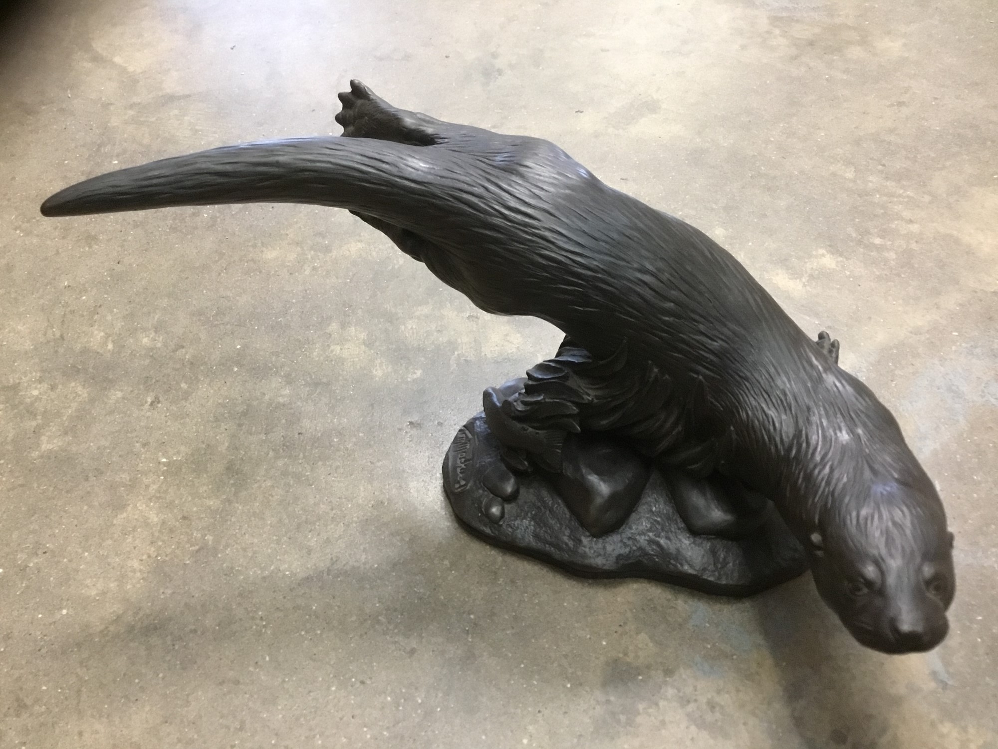 Lot 173 - Group of otter resin sculptures together