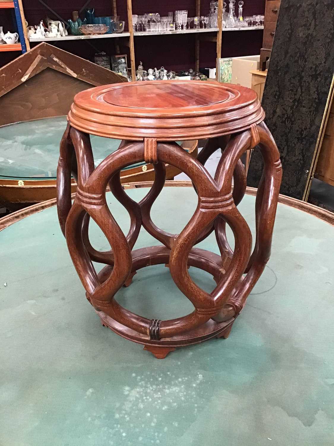 Lot 1002 - Oriental hardwood stand