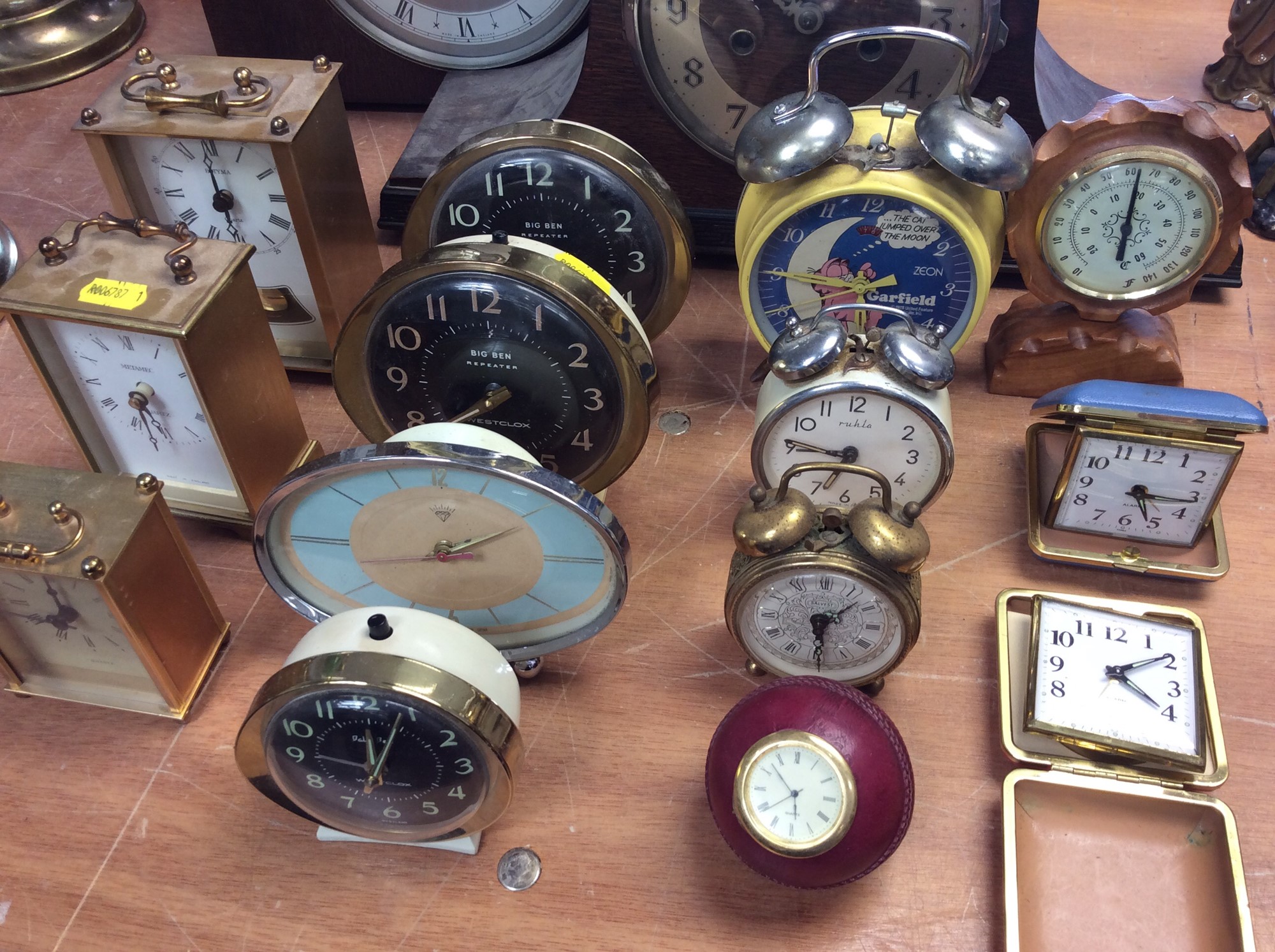 Lot 431 - Two oak cased mantel clocks, Garfield alarm