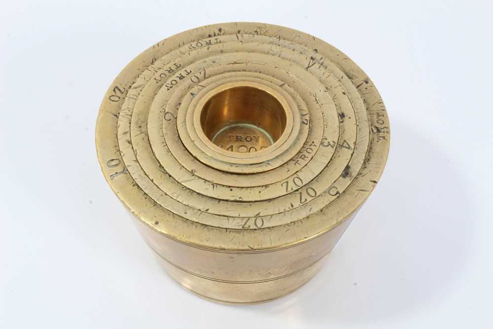 Lot 657 - Set of 19th century brass stacking weights