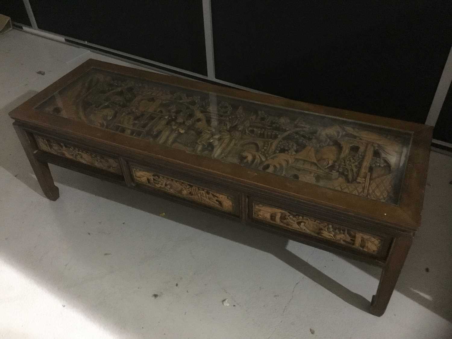 Lot 1133 - Chinese carved wooden coffee table with