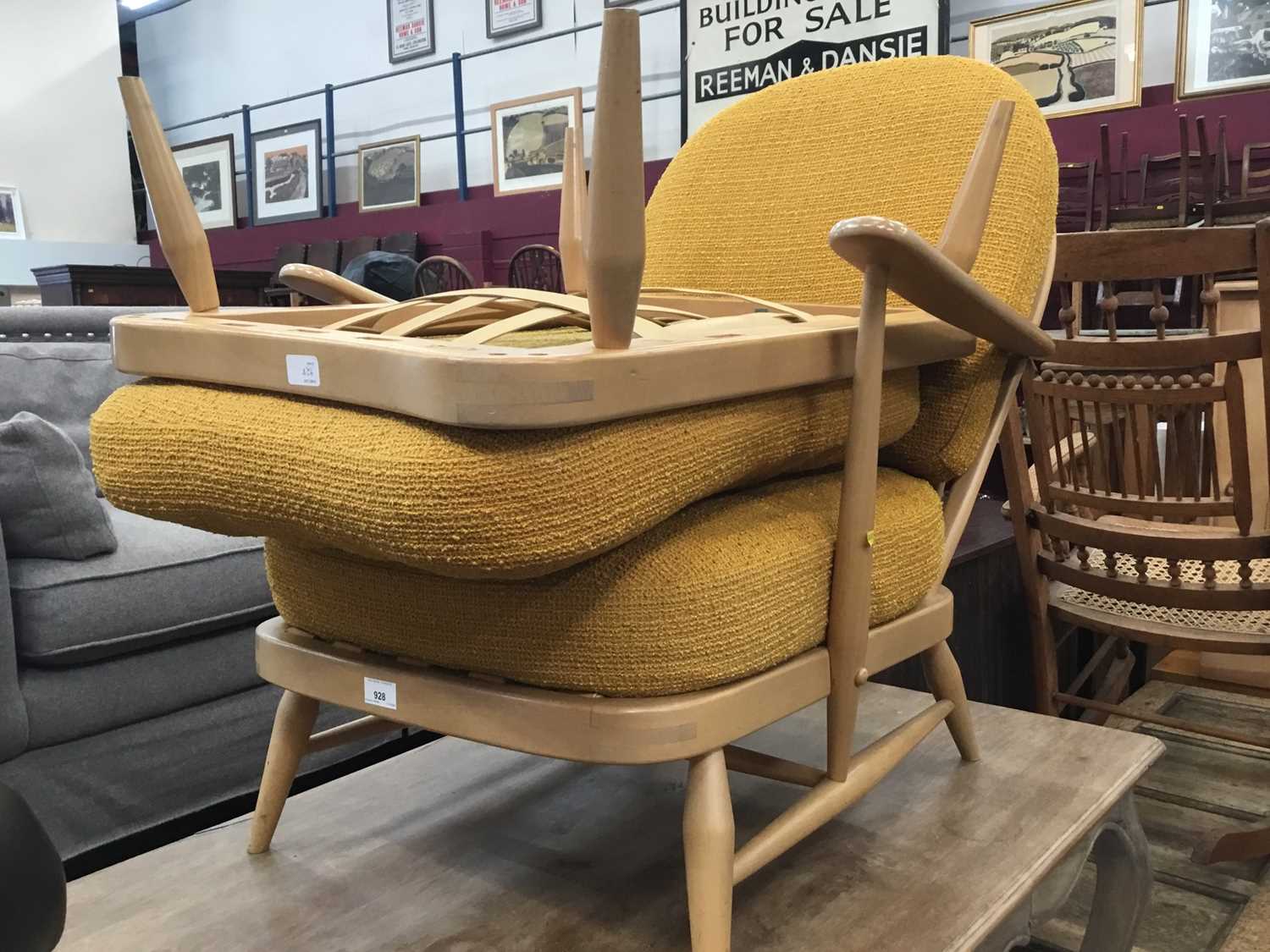 Lot 928 - Ercol stick back easy chair with matching
