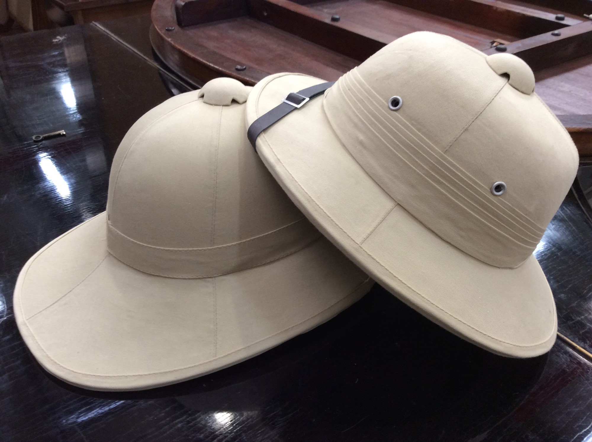 Lot 452 - Two pith helmets