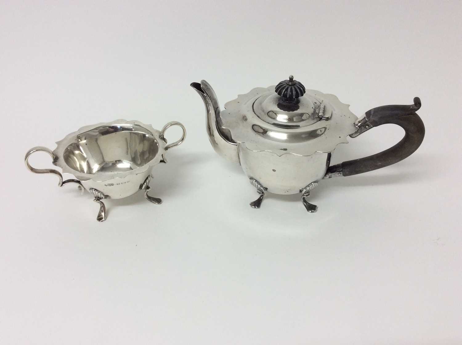 Lot 196 - Silver teapot and matching two handled sugar