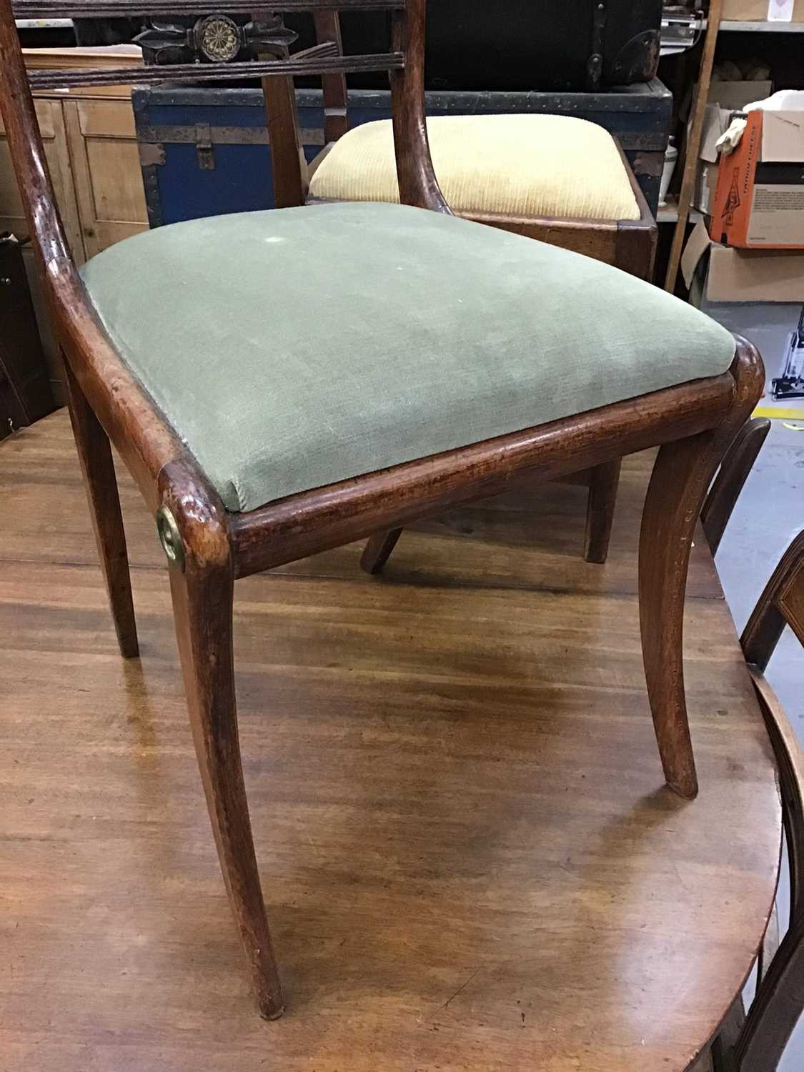 Lot 902 - Regency sabre leg chair.