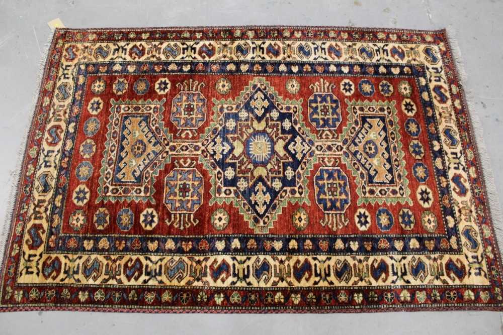 Lot 855 - Good tribal style rug