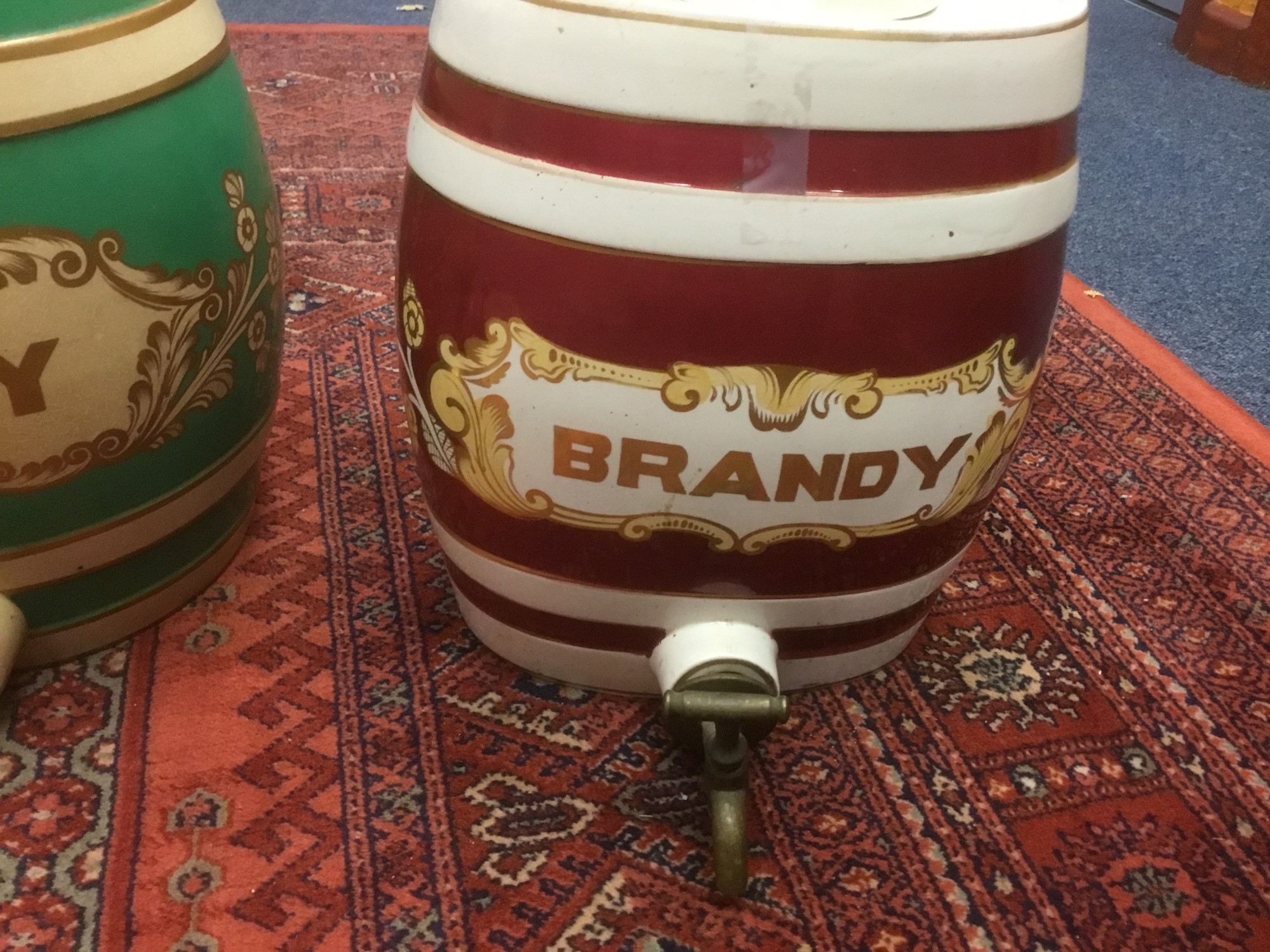 Lot 26 - Ceramic Brandy barrel, together with similar