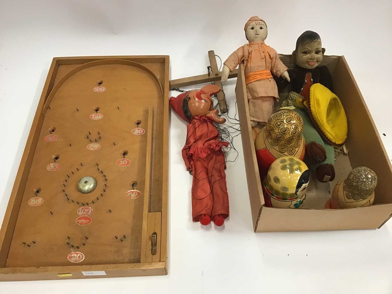 Lot 1519 - Box of dolls and toys icluding Norah
