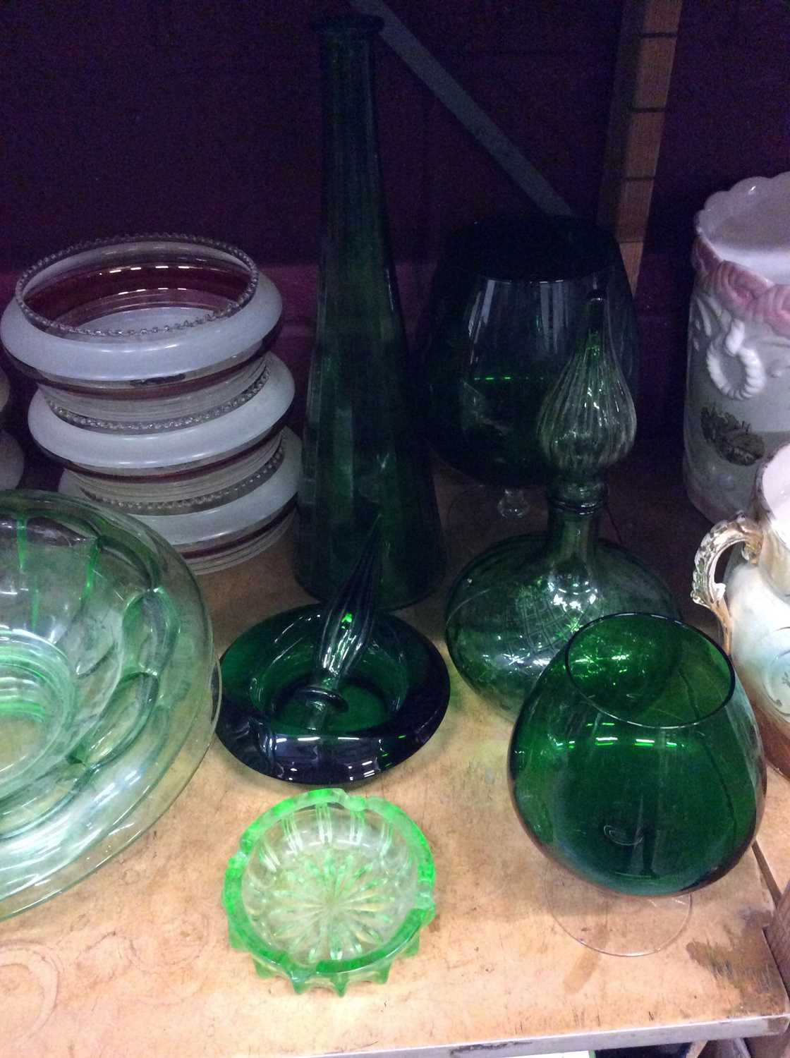 Lot 579 - Nine glass light shades, green glassware,