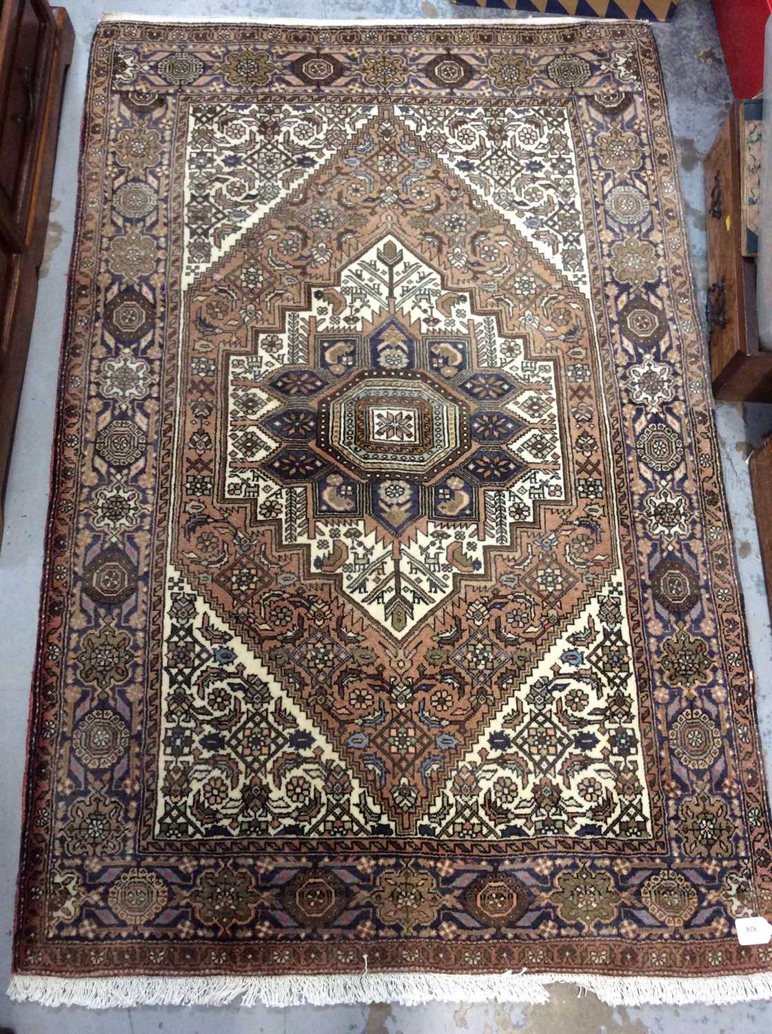 Lot 924 - Eastern rug with geometric decoration. 15cm