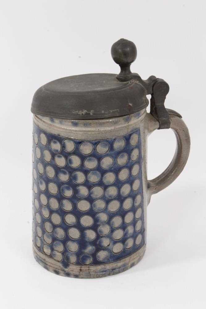 Lot 173 - An 18th Century Westerwald stoneware tankard,