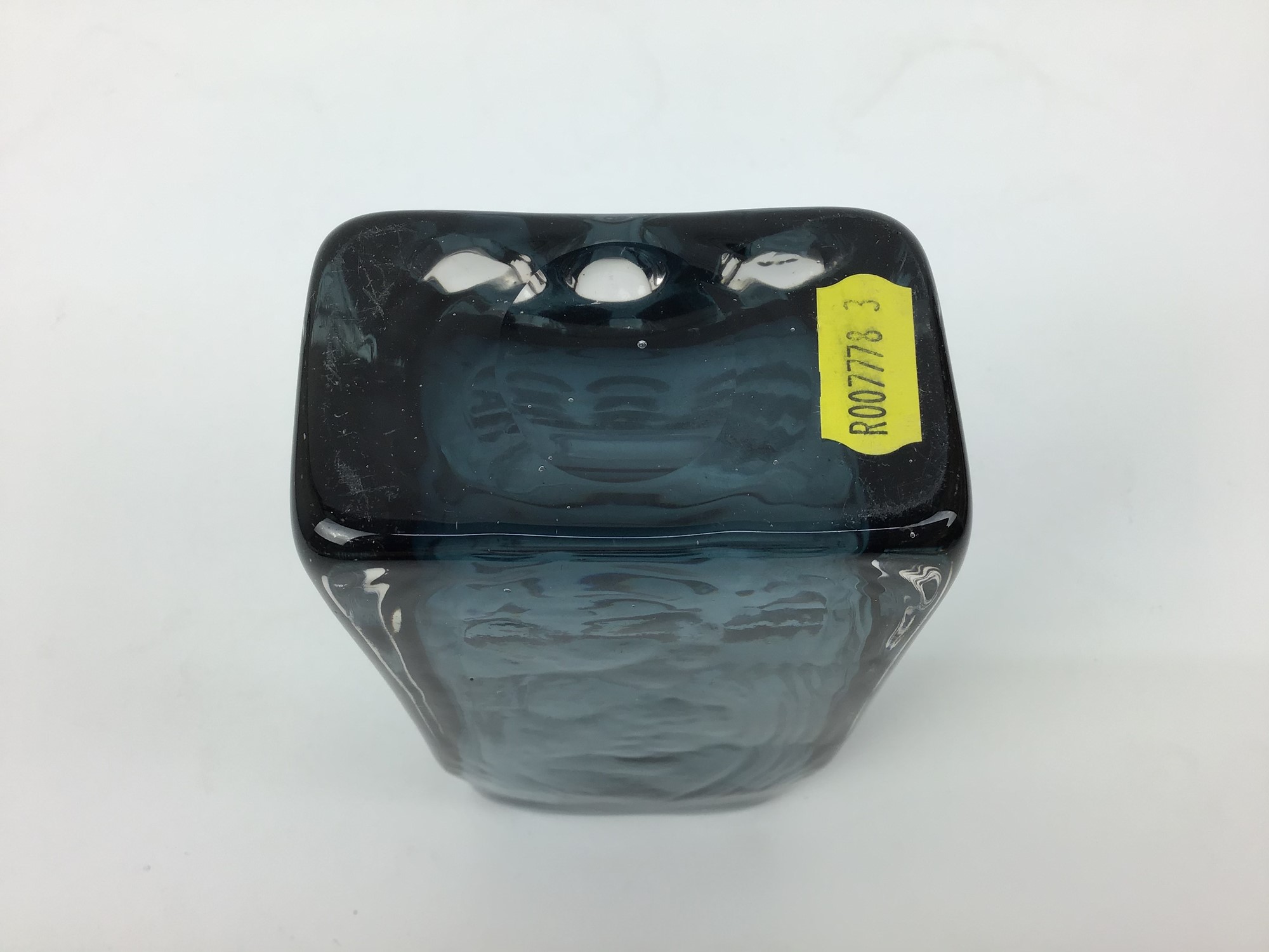 Lot 63 - Whitefriars indigo mobile phone vase designed