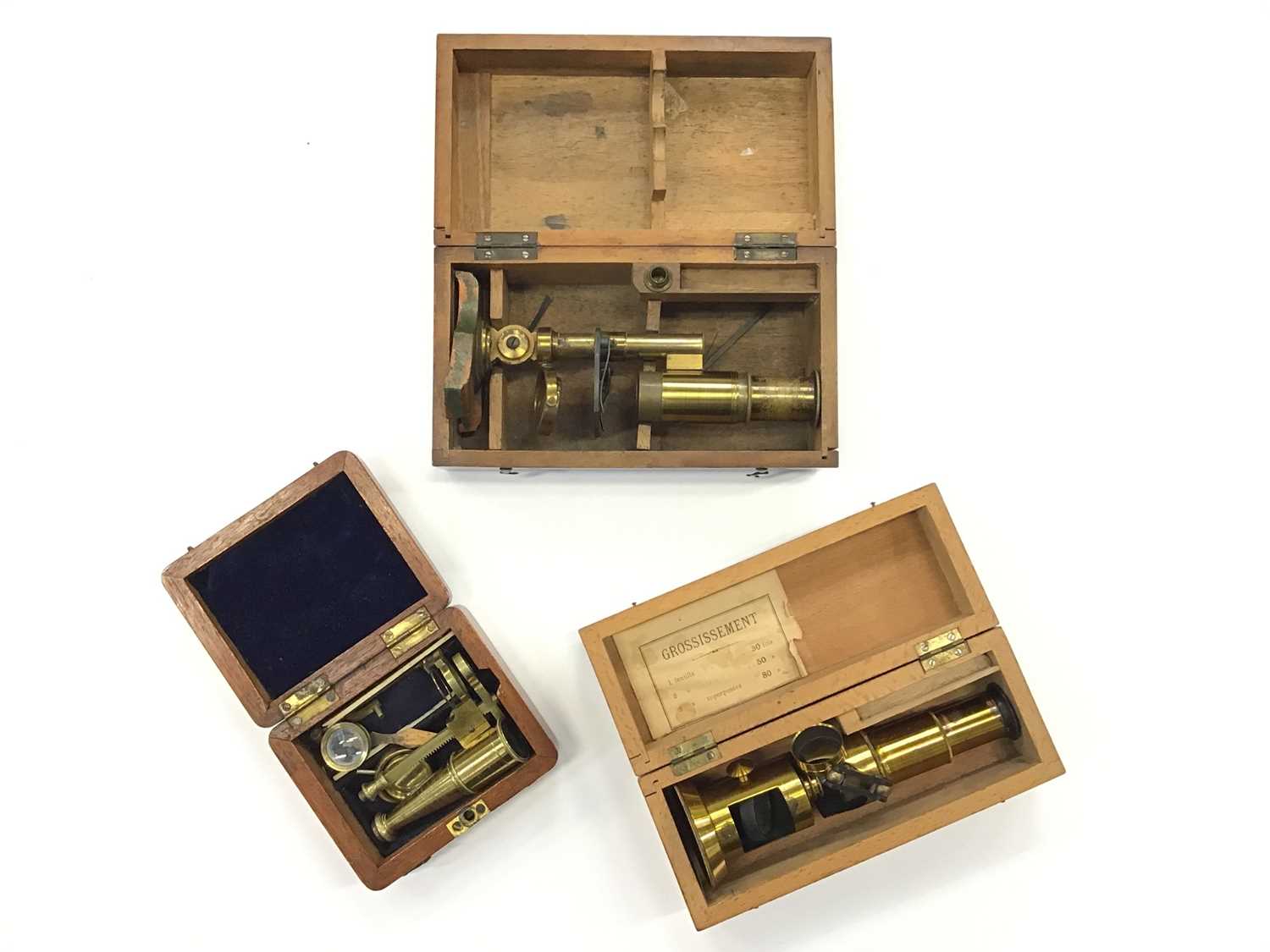Lot 2024 - Three Miniature Antique Brass Microscopes