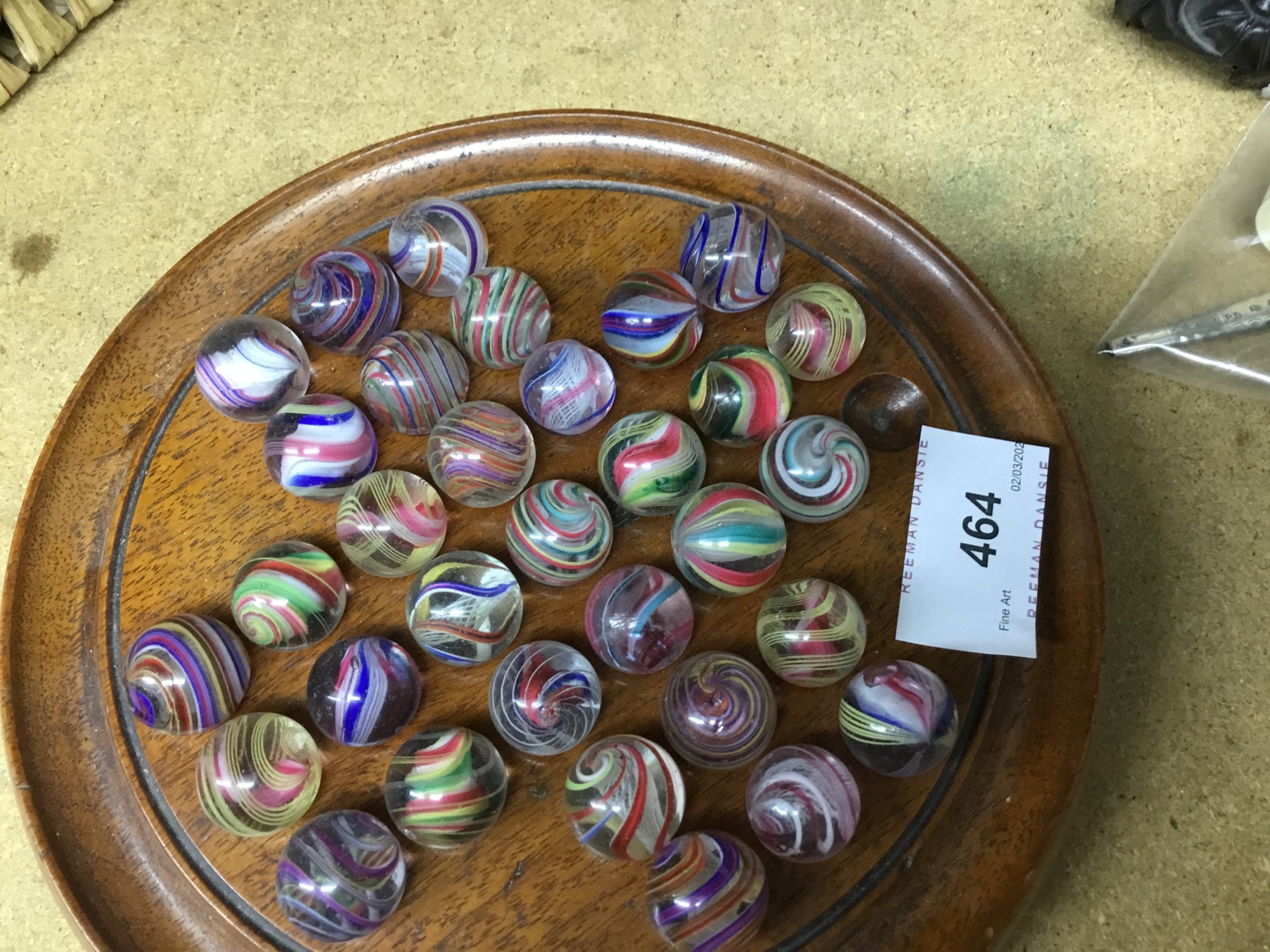 Lot 464 - Victorian glass marbles on a solitaire board